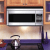 Sharp R1874TY 1.1 cu. ft. Over-the-Range Convection Microwave Oven with ...